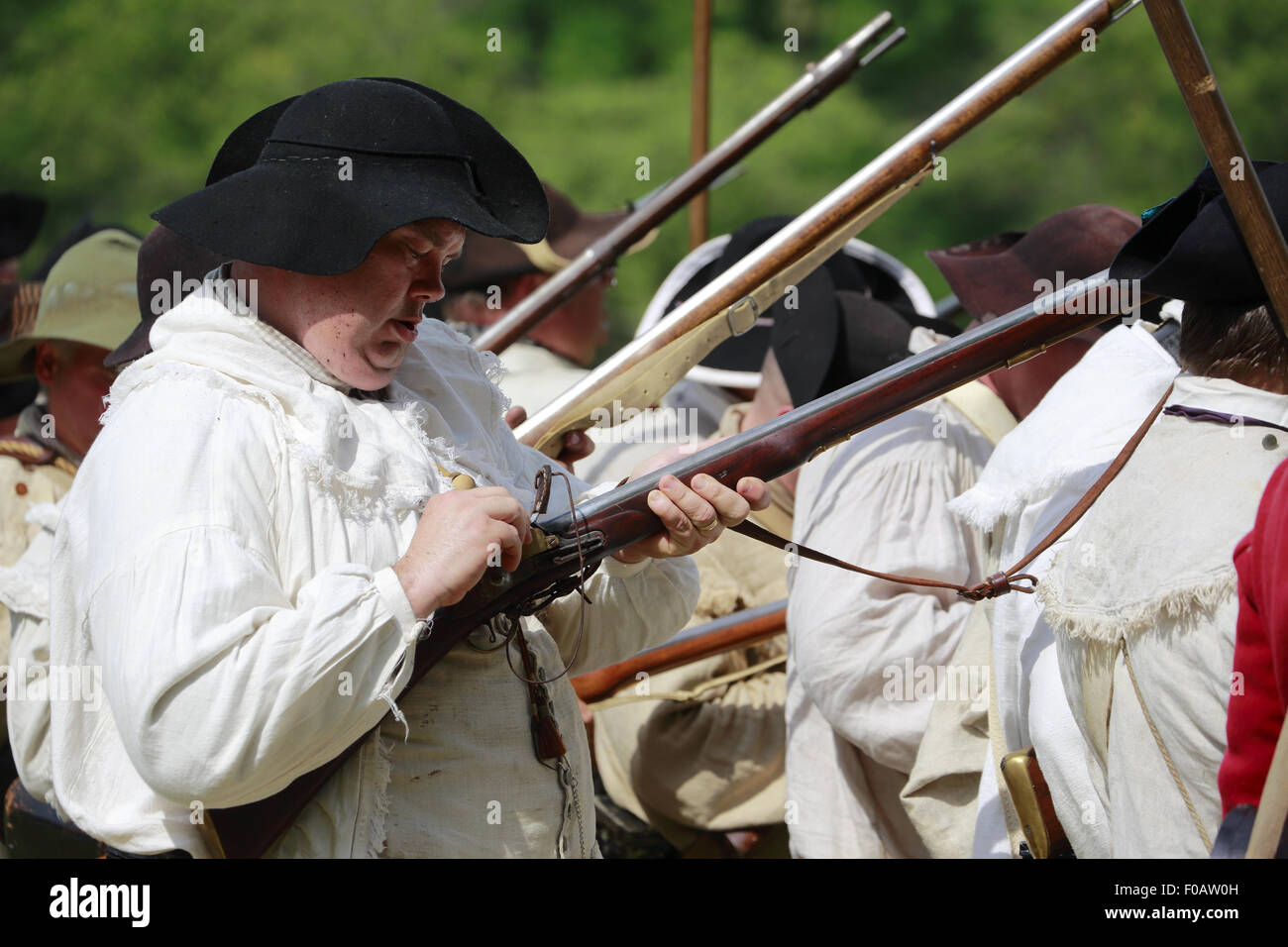 Continental Army soldiers with muskets in Revolutionary War reenactment ...