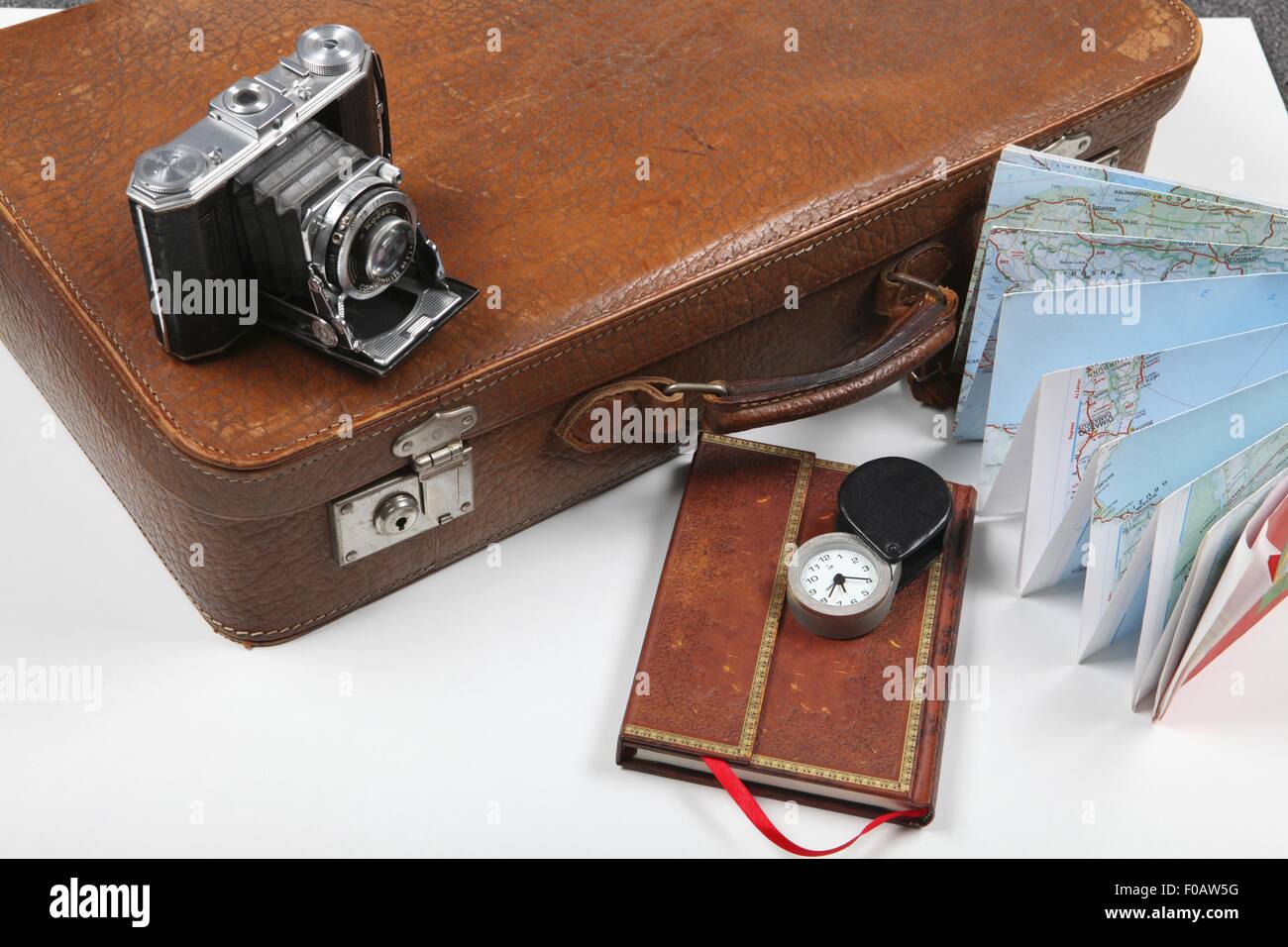 Diary, camera, briefcase and map for travel on white background Stock ...