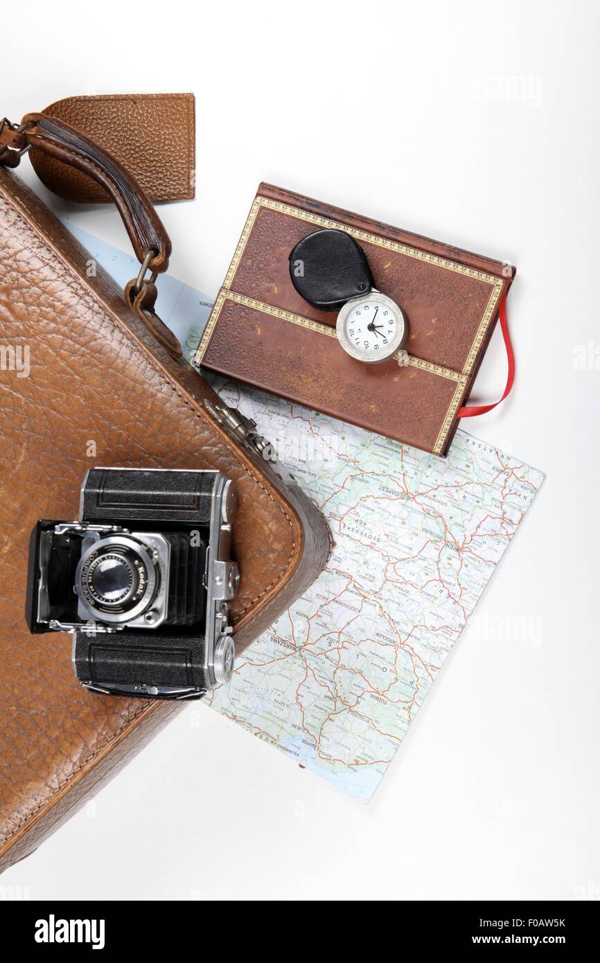 Diary, camera, briefcase and map for travel on white background Stock ...