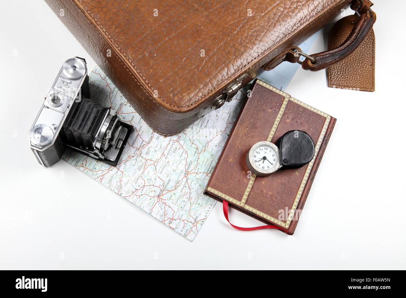 Diary, camera, briefcase and map for travel on white background Stock ...