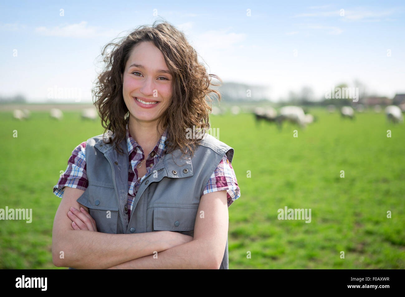 View of a young attractive farmer in fields Stock Photo - Alamy