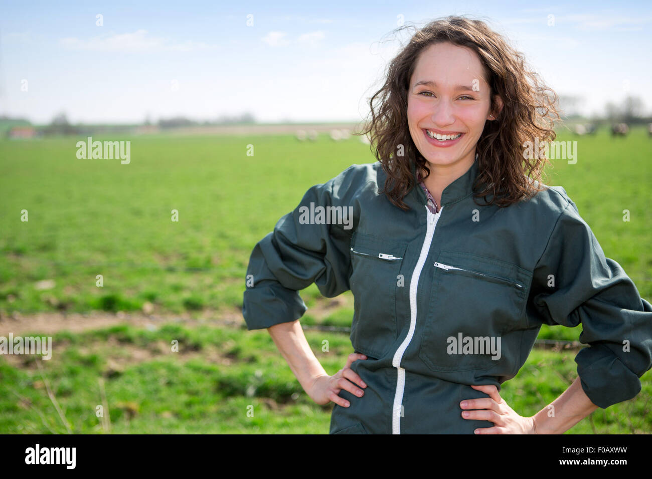 View of a young attractive farmer in fields Stock Photo - Alamy