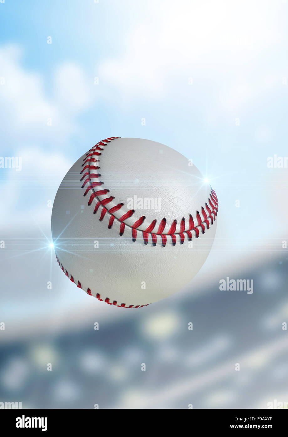 A regular baseball ball flying through the air on a stadium background ...
