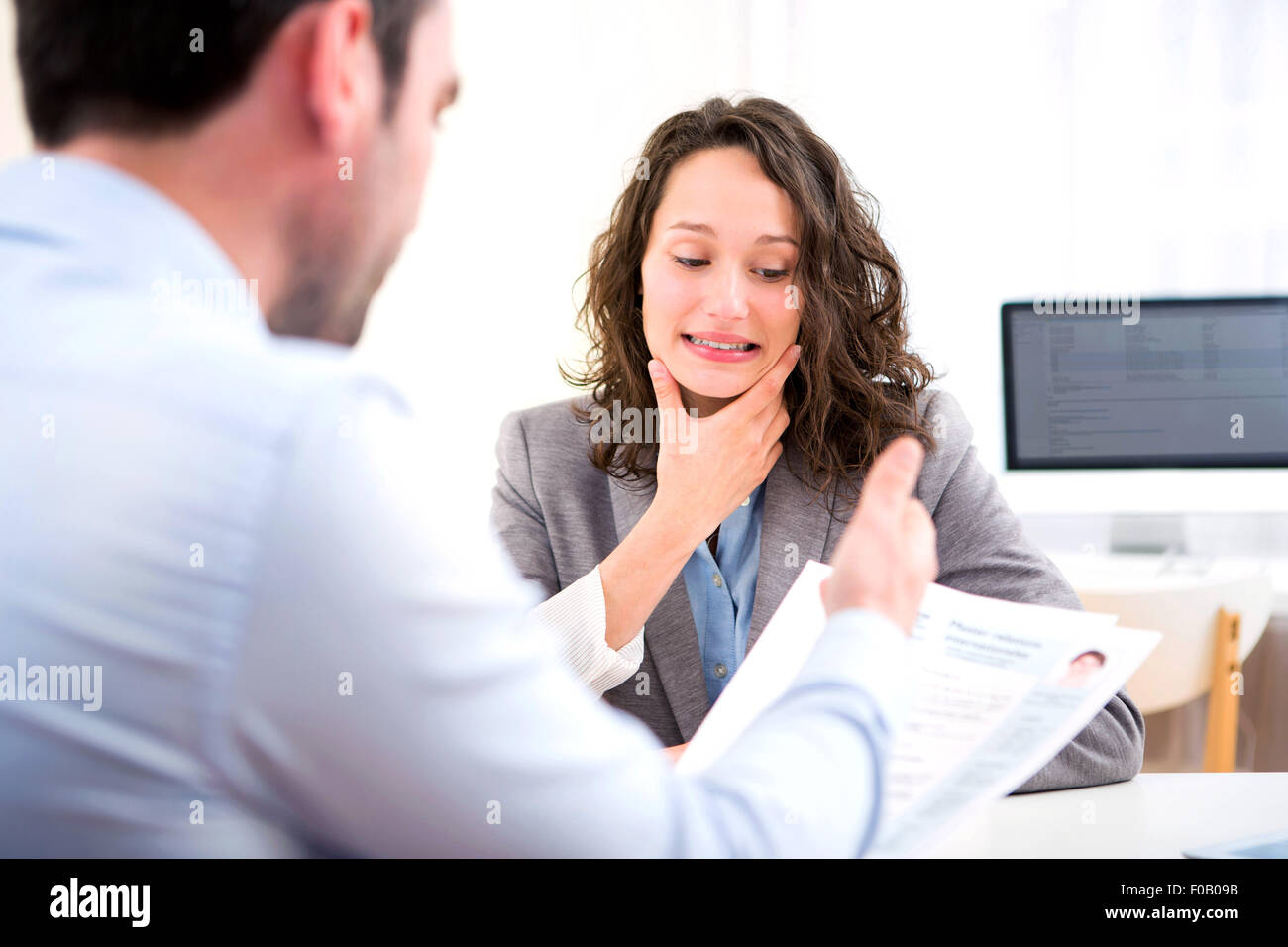 View of a Young attractive woman during job interview Stock Photo - Alamy