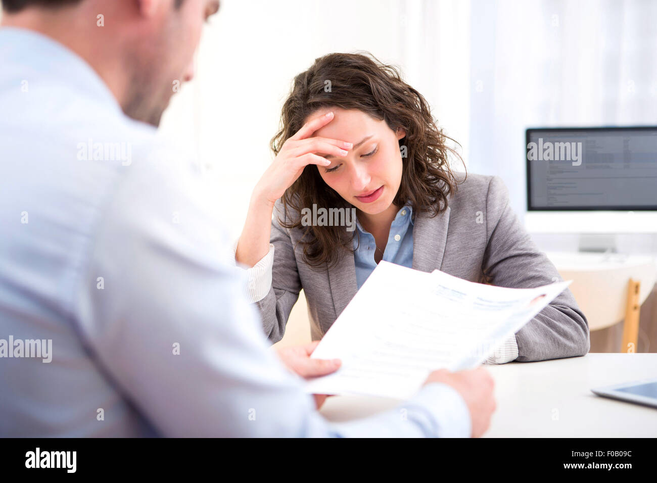 View of a Young attractive woman during job interview Stock Photo - Alamy
