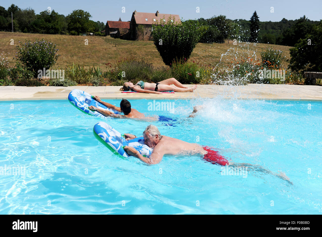 Family swimming pool france hi-res stock photography and images - Alamy