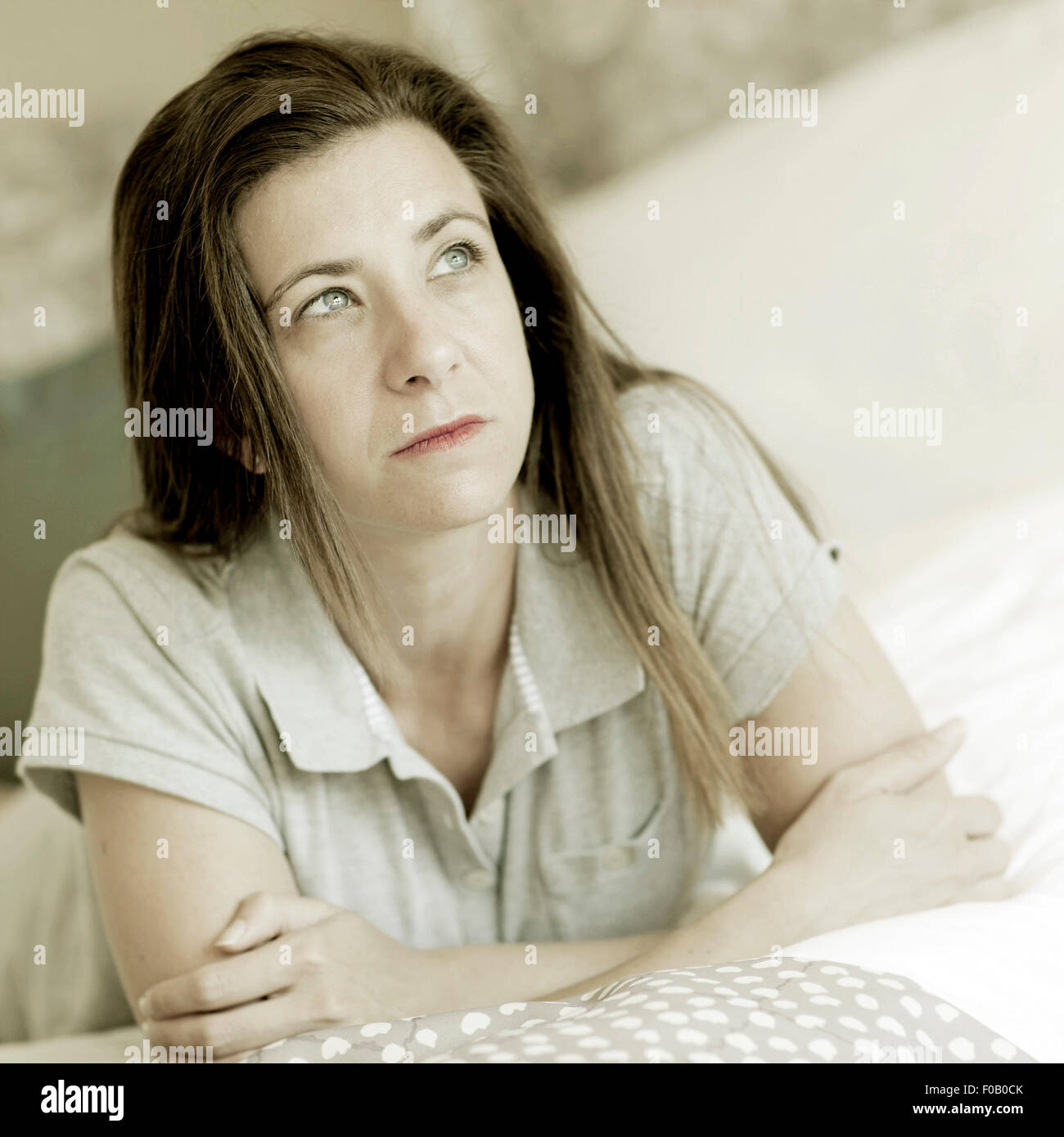 Lonely sad woman deep in thoughts Stock Photo - Alamy