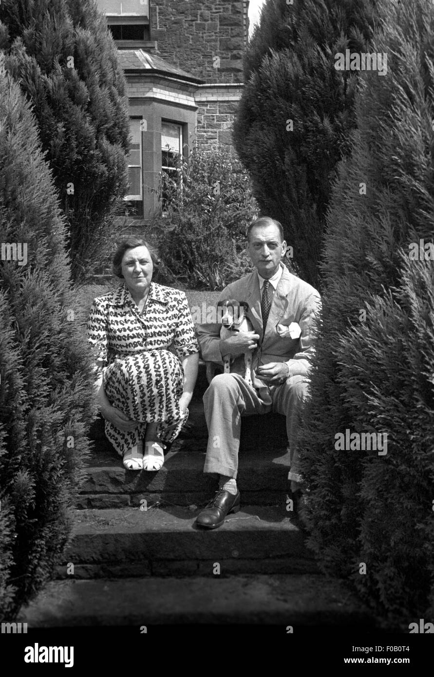 Sitting man dog Black and White Stock Photos & Images - Alamy