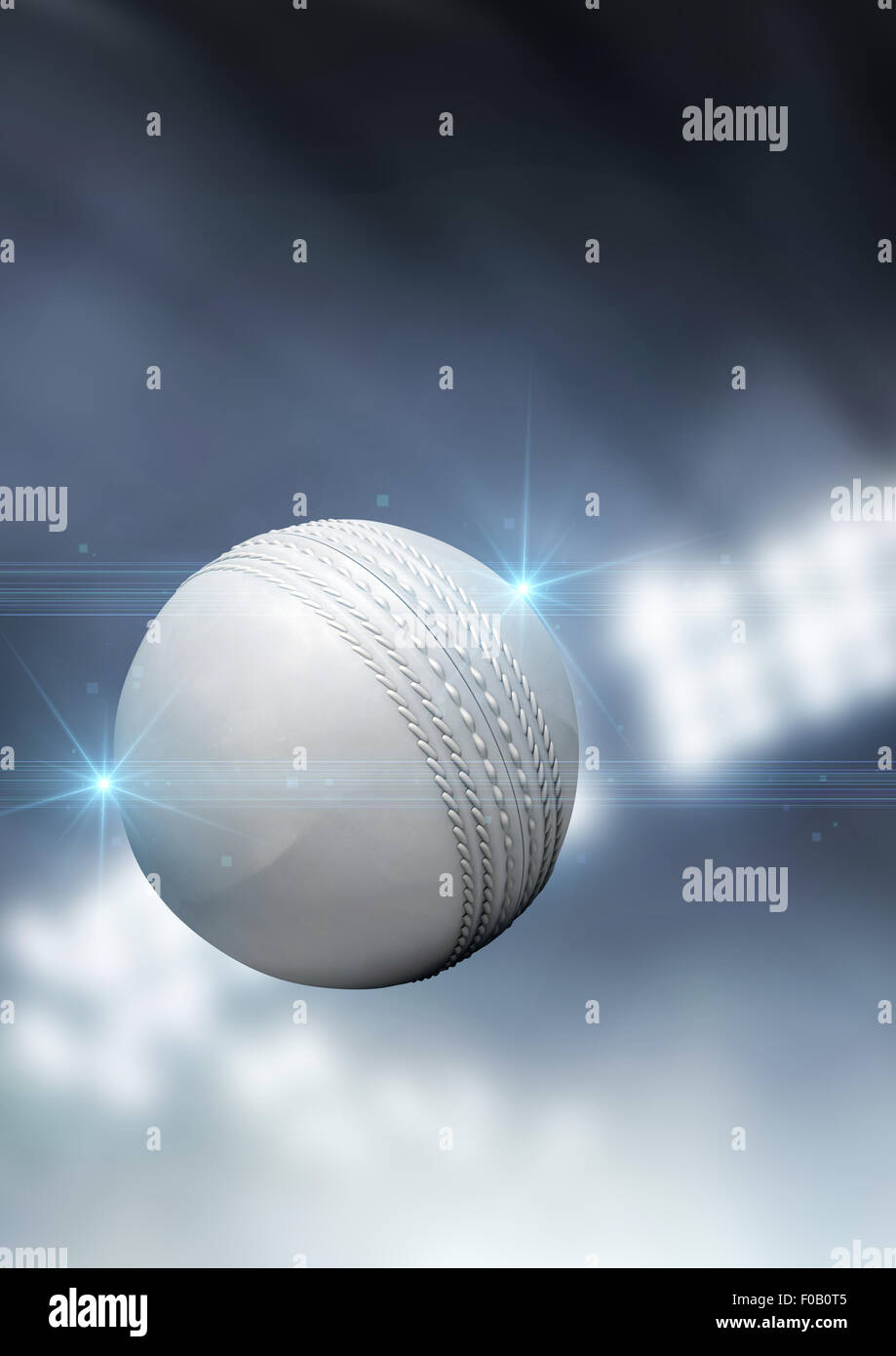 A regular white cricket ball flying through the air on an indoor ...