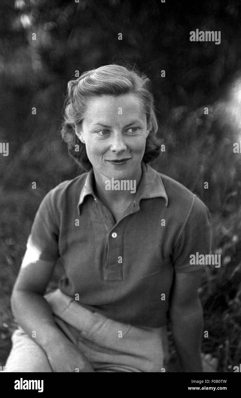 Smiling woman sitting Black and White Stock Photos & Images - Alamy