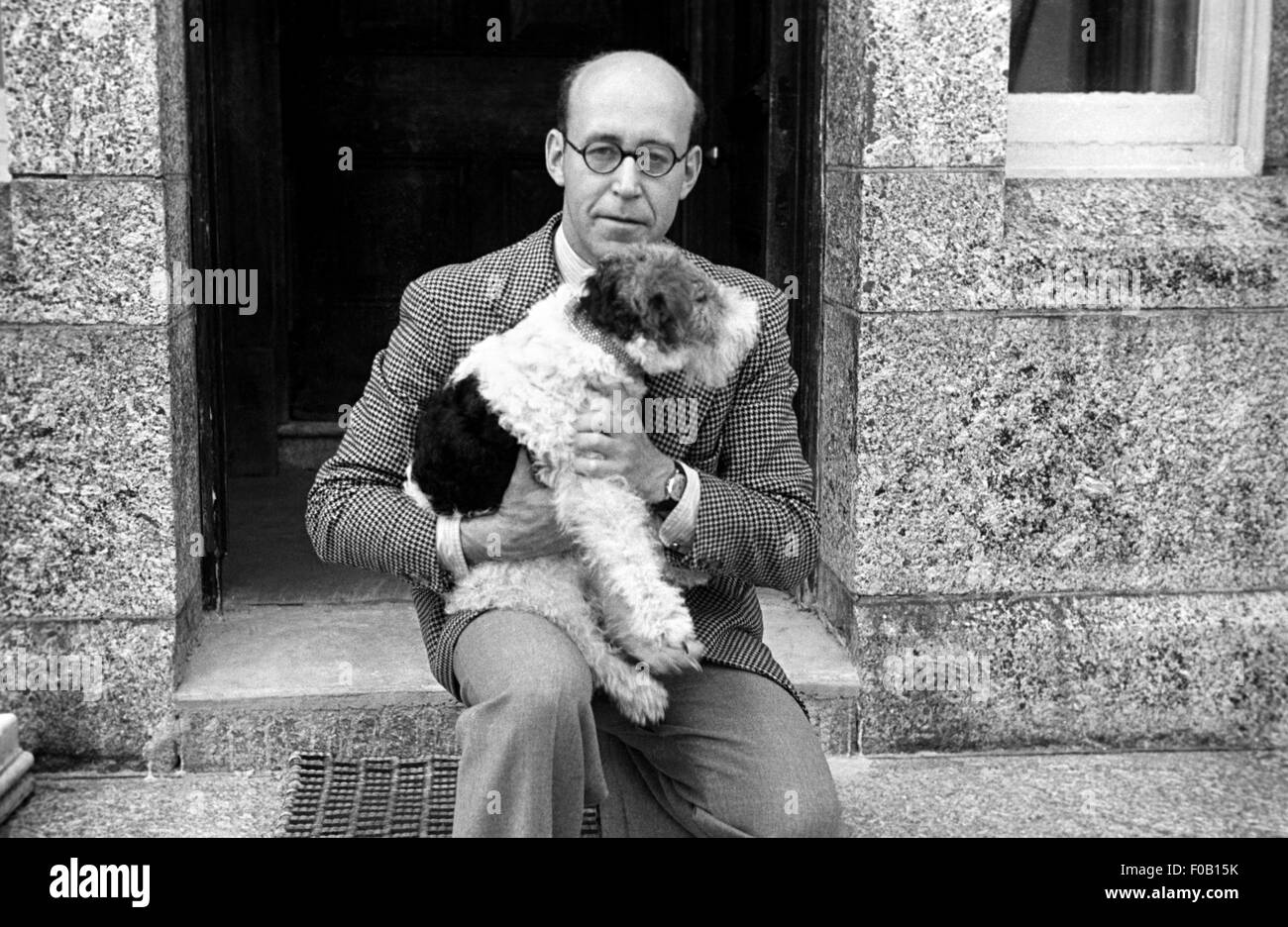 Sitting man dog Black and White Stock Photos & Images - Alamy