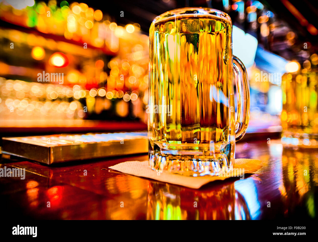 Pint of beer on a bar in a traditional style pub Stock Photo - Alamy