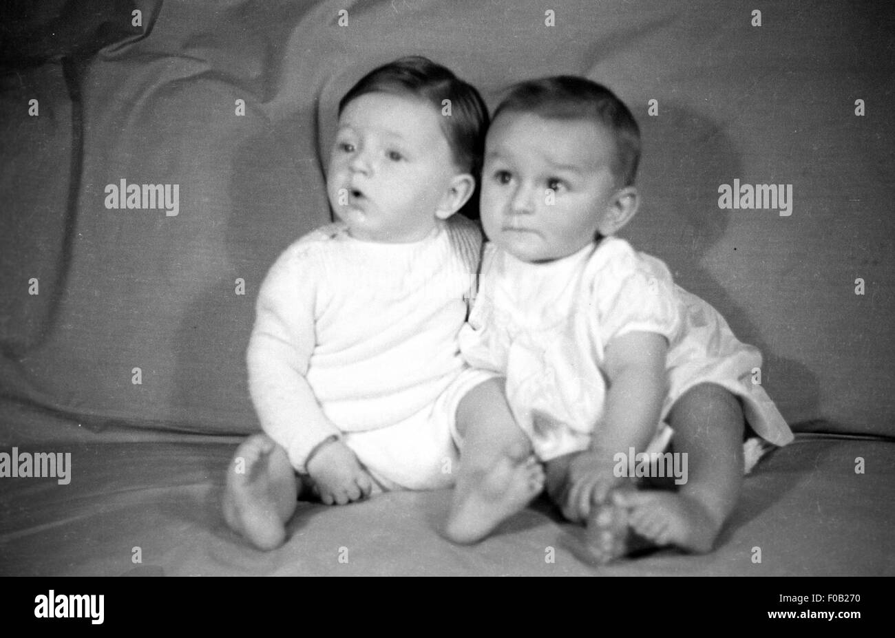 A portrait of two babies Stock Photo - Alamy