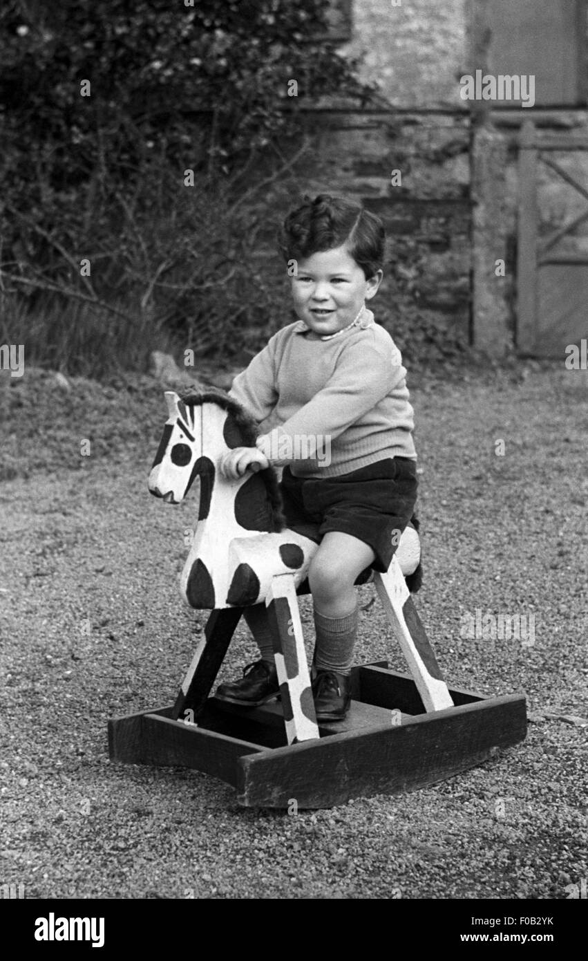 A little boy on his toy rocking horse Stock Photo - Alamy