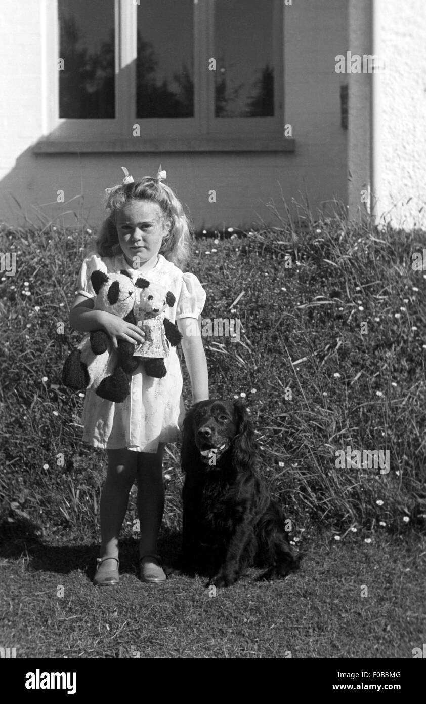 Retro girl and dog Black and White Stock Photos & Images - Alamy