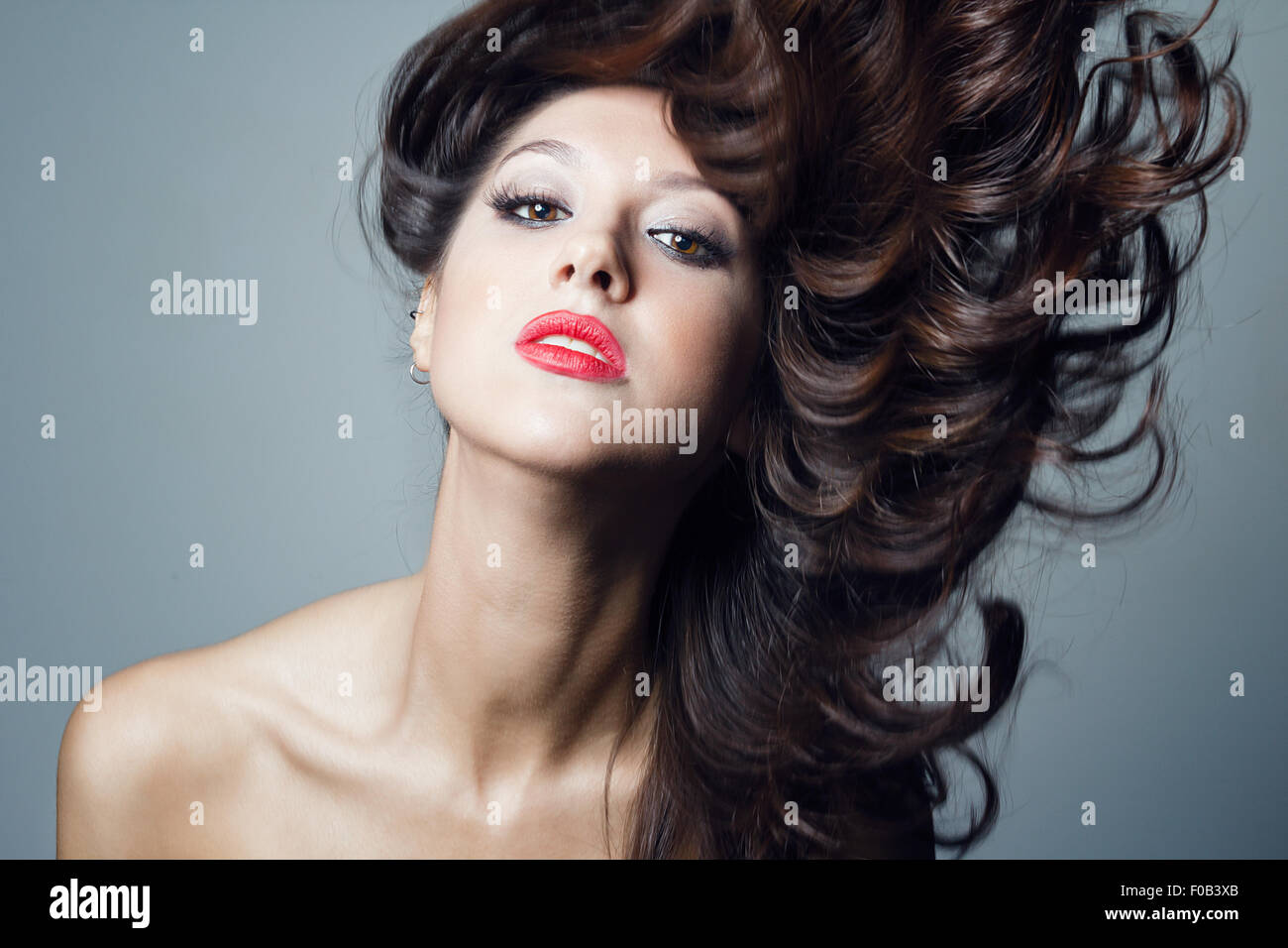 Photo of beautiful brunette woman with magnificent hair Stock Photo - Alamy