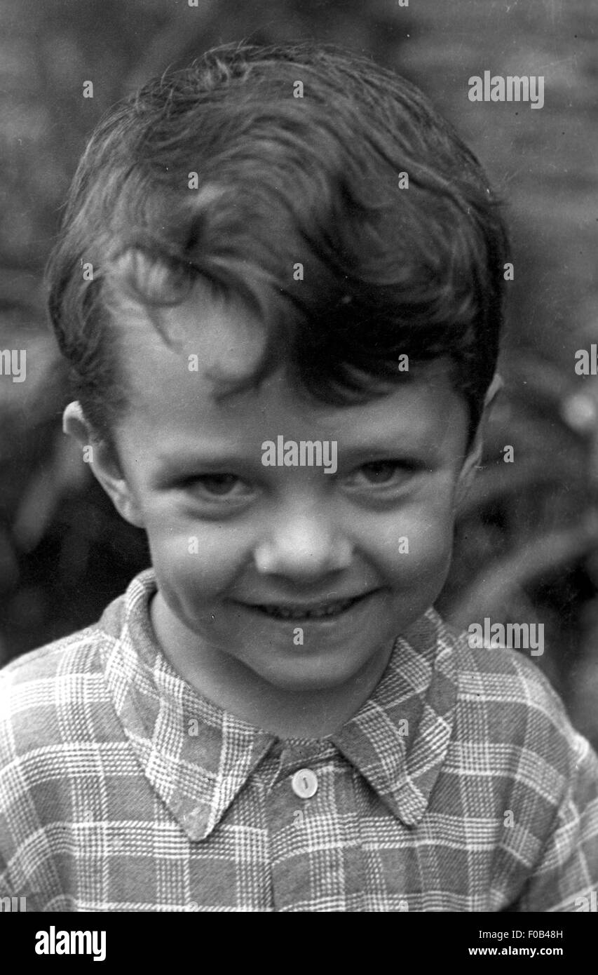 Kid boy black hair Black and White Stock Photos & Images - Alamy