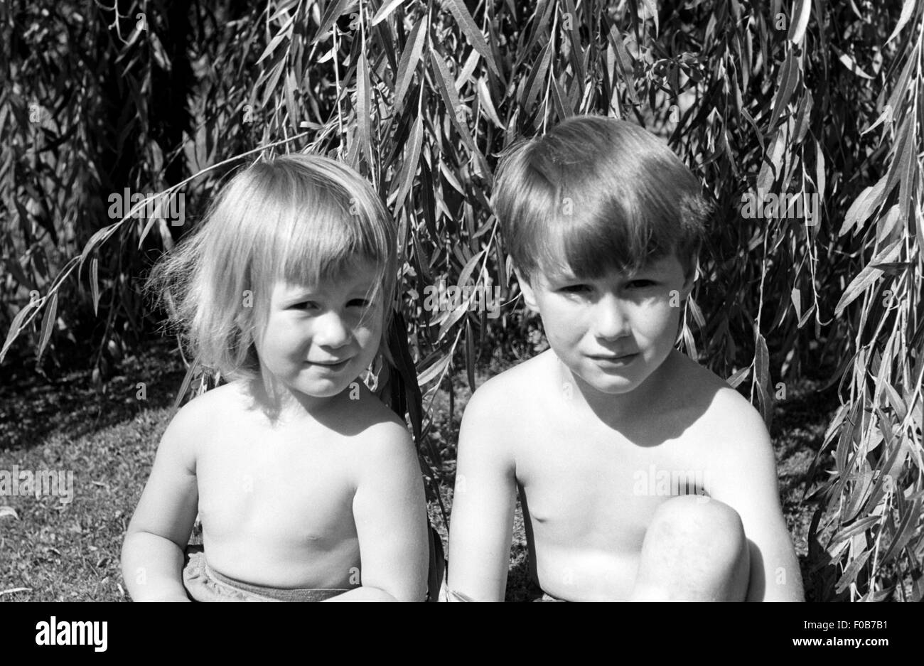 Male children playing Black and White Stock Photos & Images - Alamy