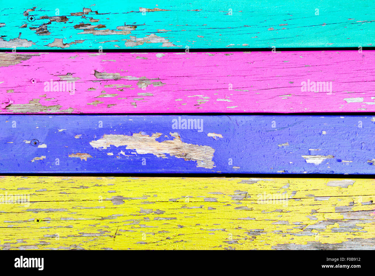 colorful wooden fence as a background Stock Photo - Alamy