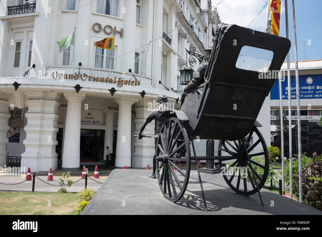 A Rickshaw sculpture in front of the old colonial(1870) Grand Oriental ...
