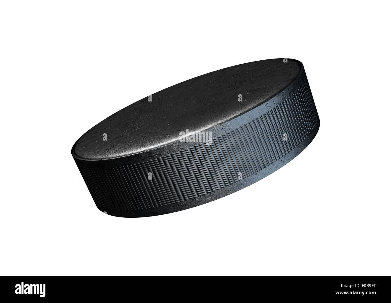 A regular rubber ice hockey puck on an isolated white studio background ...