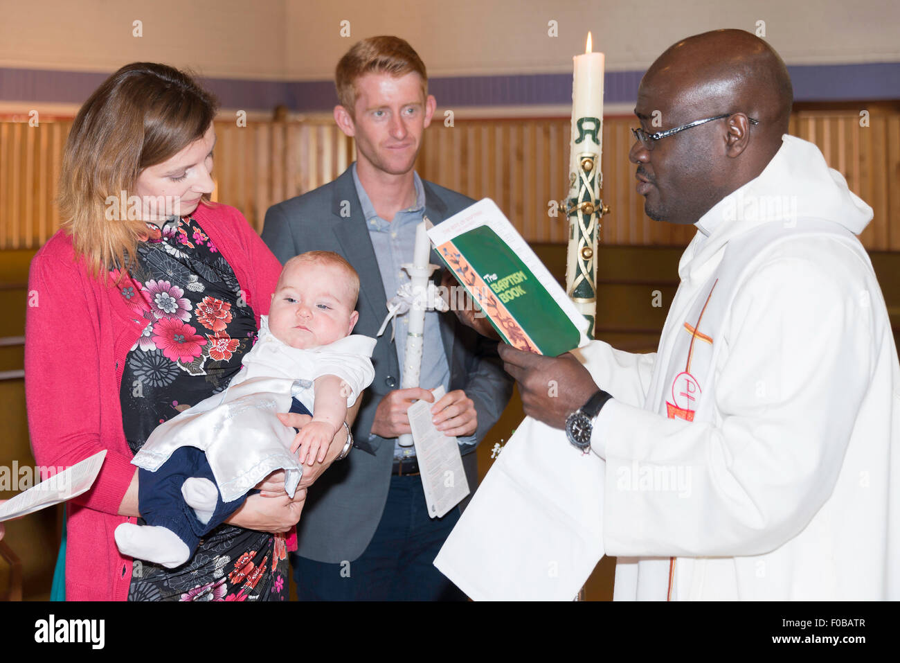 Christening hi-res stock photography and images - Alamy
