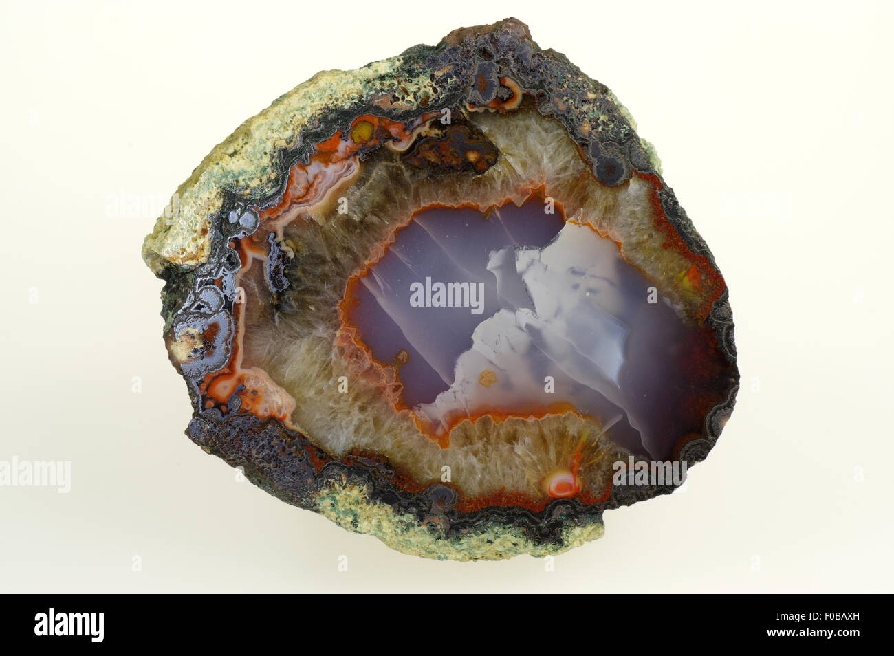 Agate, a cross section of agate stone on a black background. Origin ...