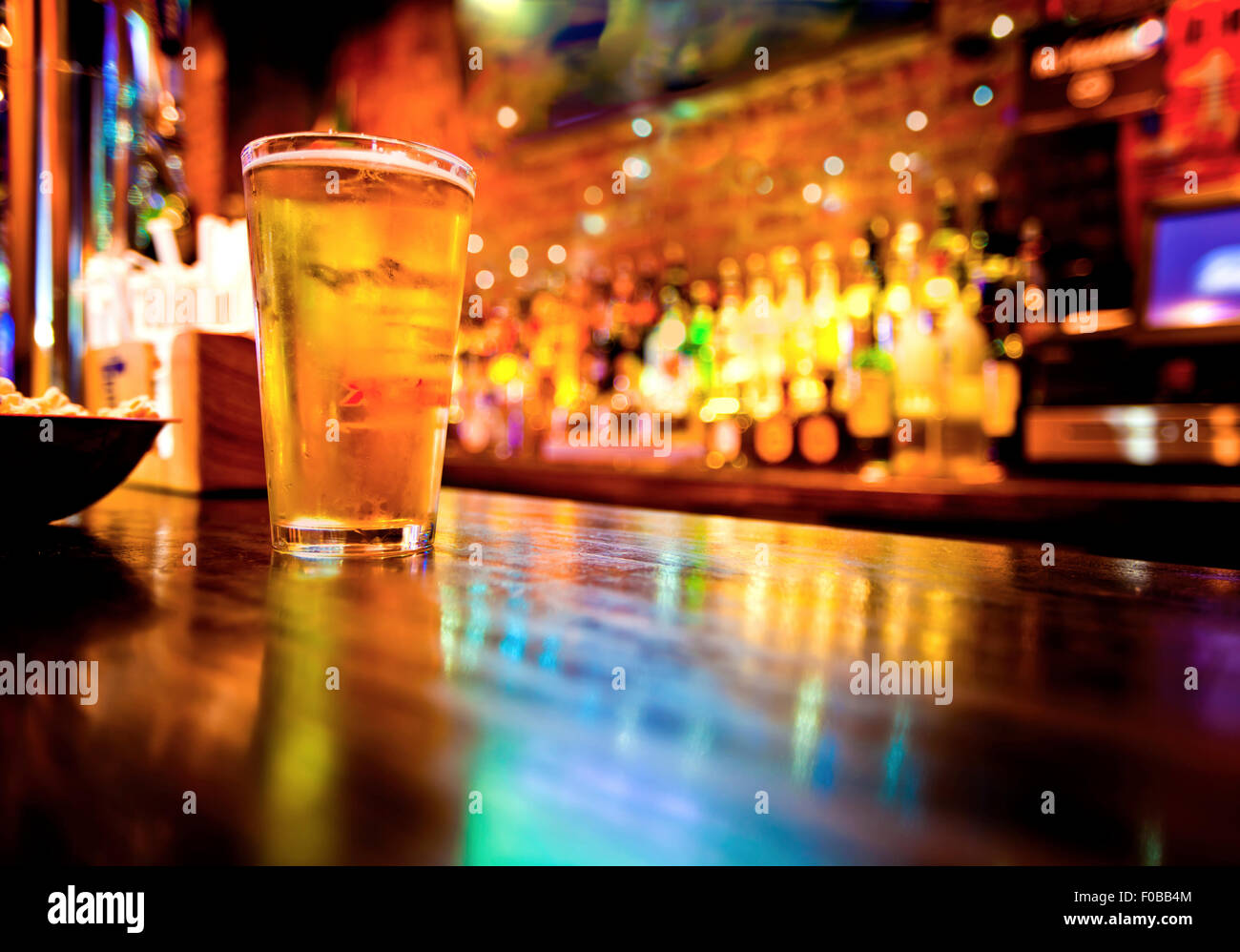 Pint of beer on a bar in a traditional style pub Stock Photo - Alamy