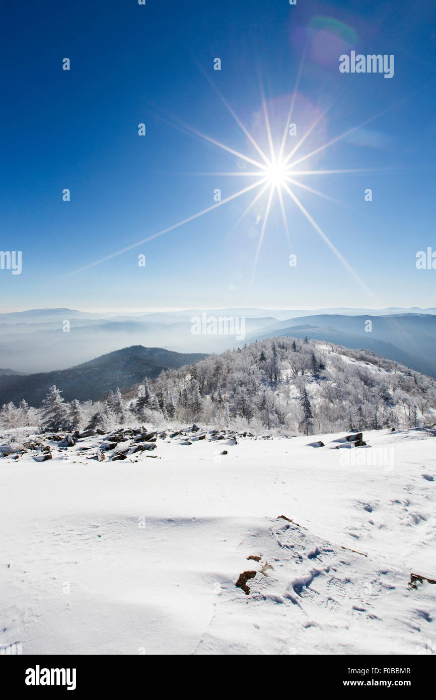 Sun shining on snow, China Stock Photo - Alamy