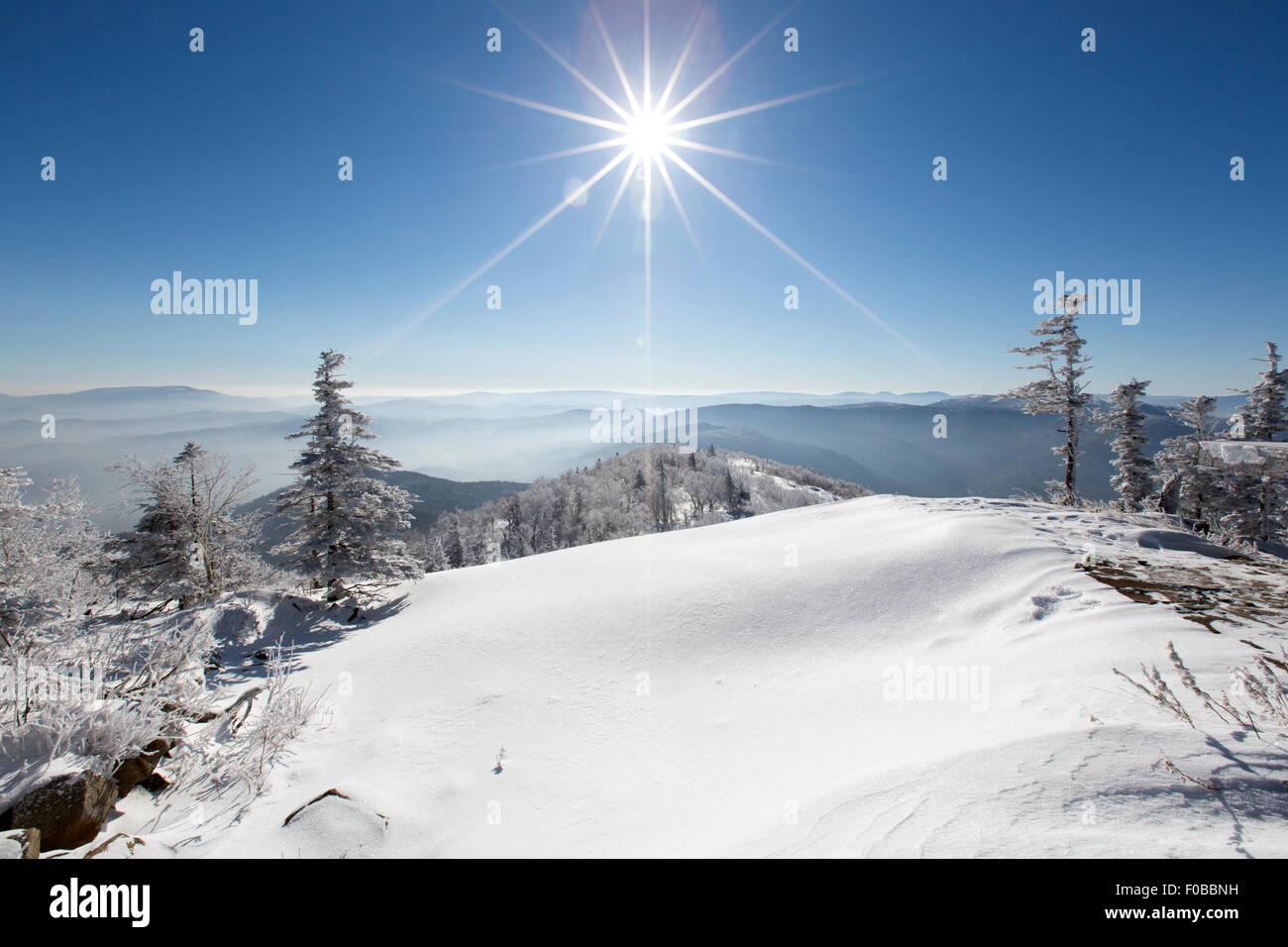 Sun shining on snow, China Stock Photo - Alamy
