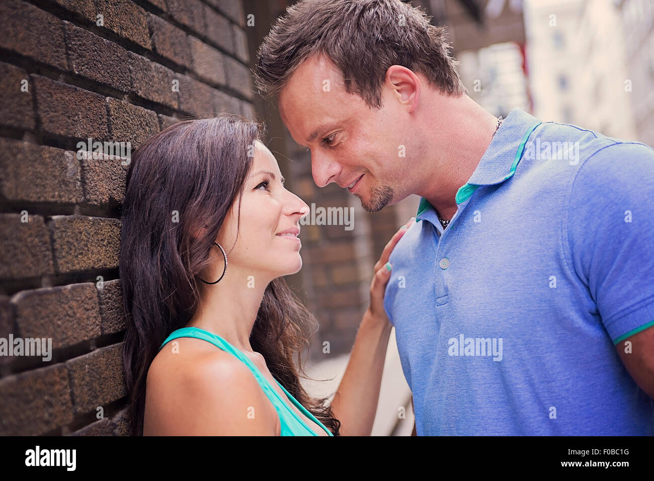 urban couple on a street having fun Stock Photo - Alamy
