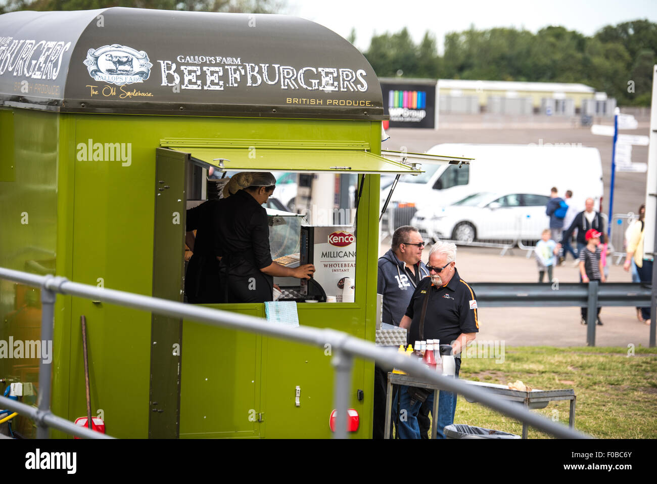 Two men at a Gallops Farm Beefburger van at Donington Raceway ...
