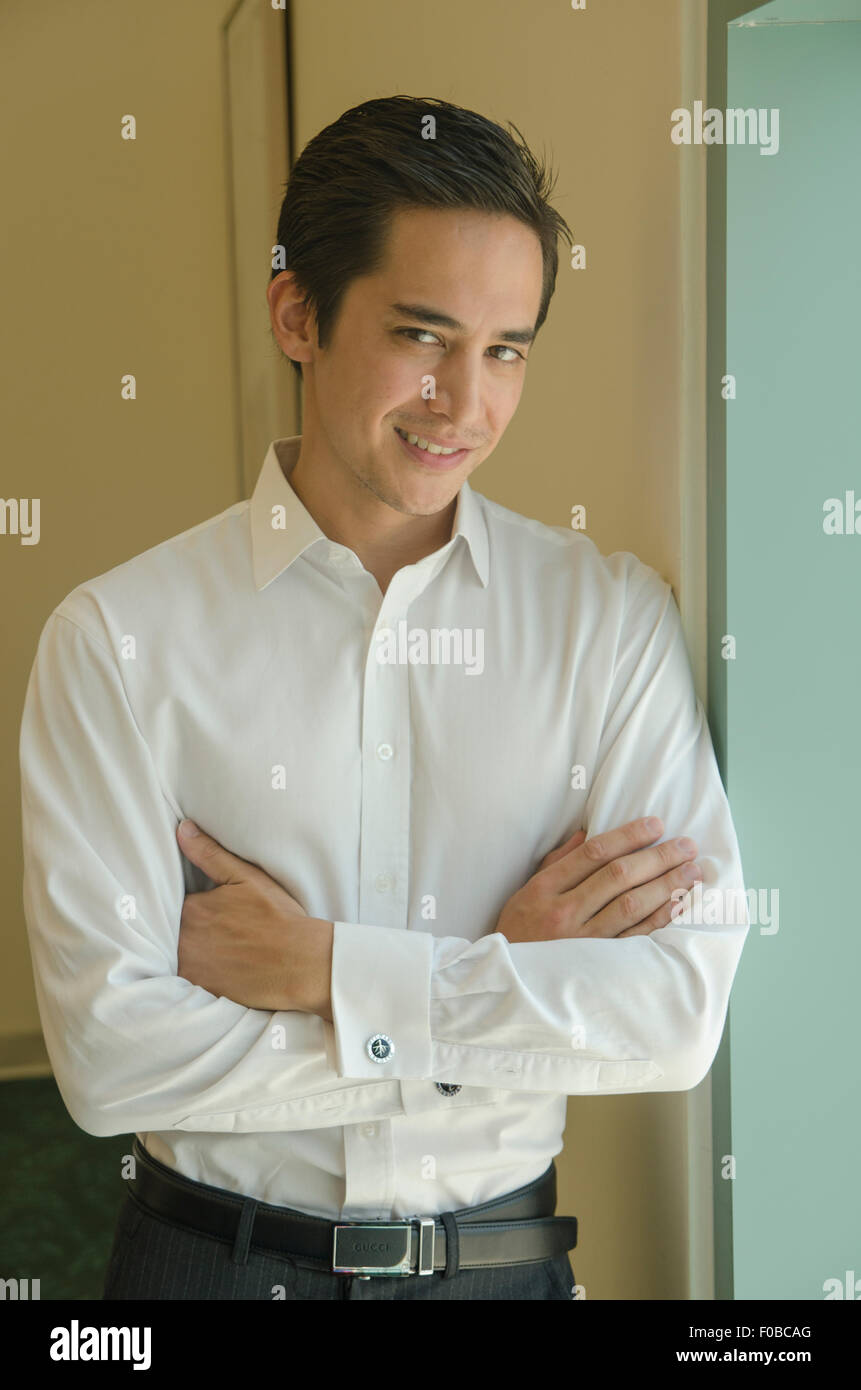 Asian Man in Library wearing suit Stock Photo - Alamy