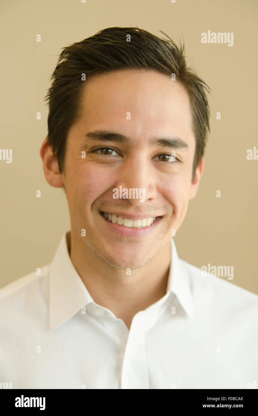 Asian Man in Library wearing suit Stock Photo - Alamy