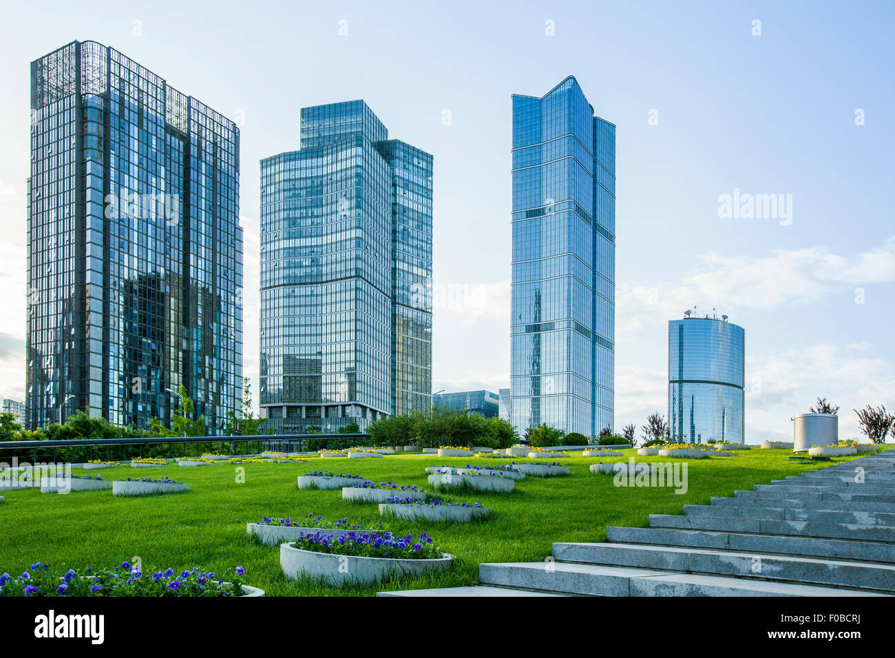 Modern buildings and green area, China Stock Photo - Alamy
