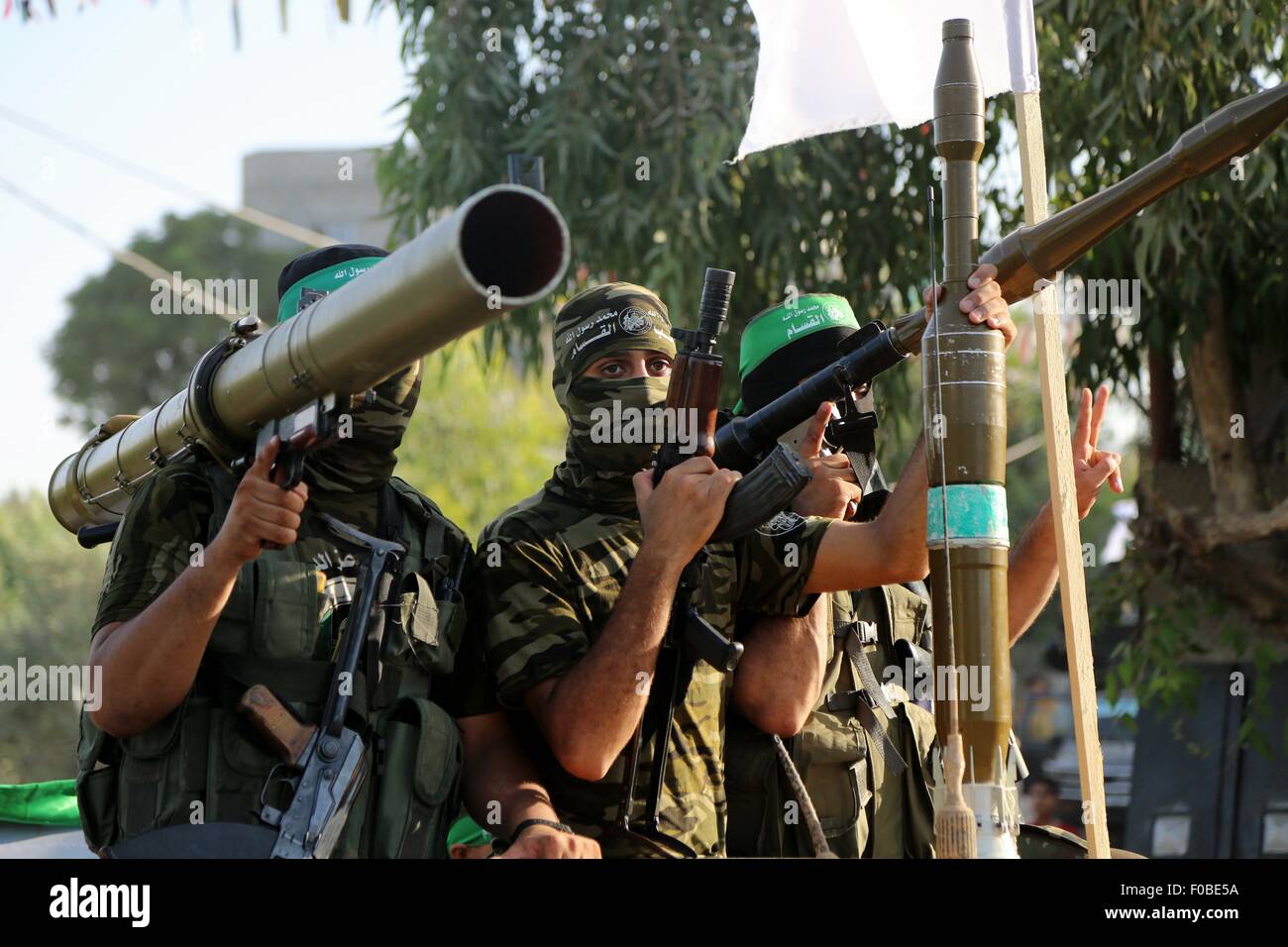 Gaza. 11th Aug, 2015. Masked Palestinian gunmen from Ezzedine al-Qassam ...
