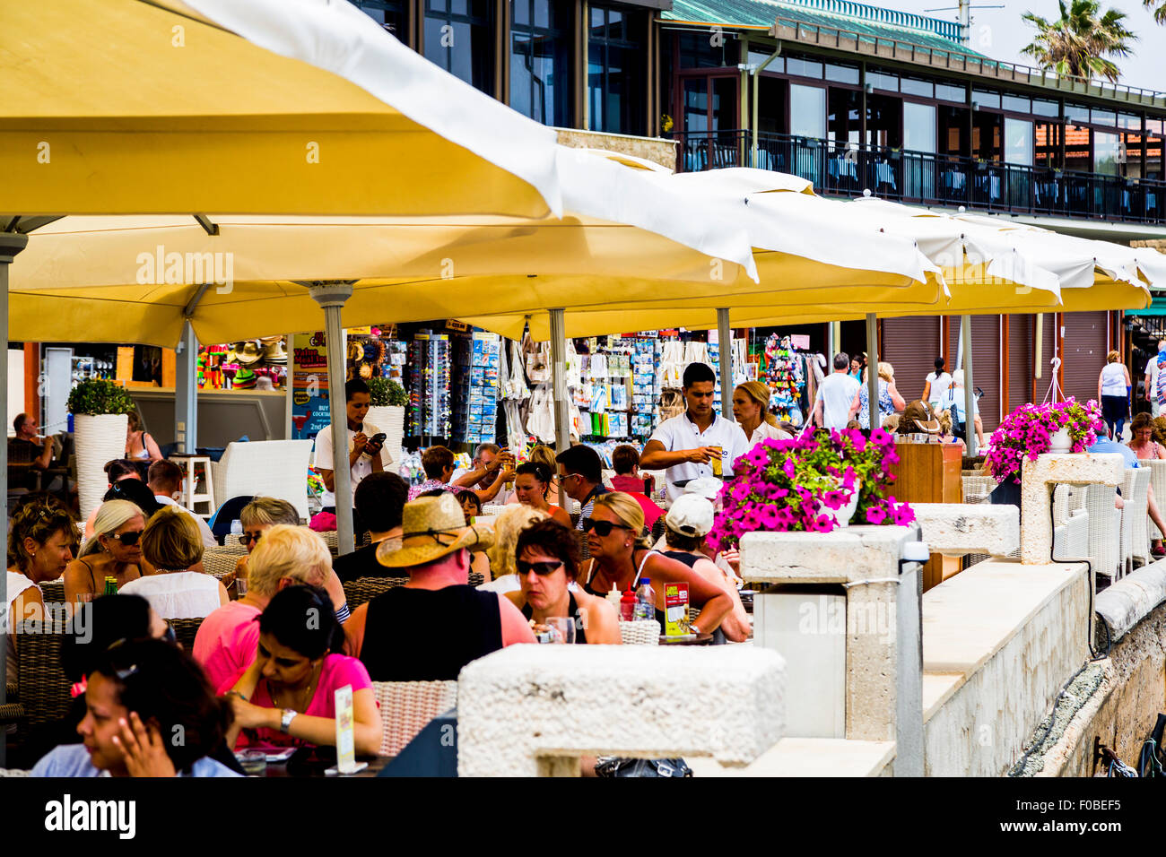 Dining al fresco on a beautiful day at Paphos sea front - Cyprus Stock ...