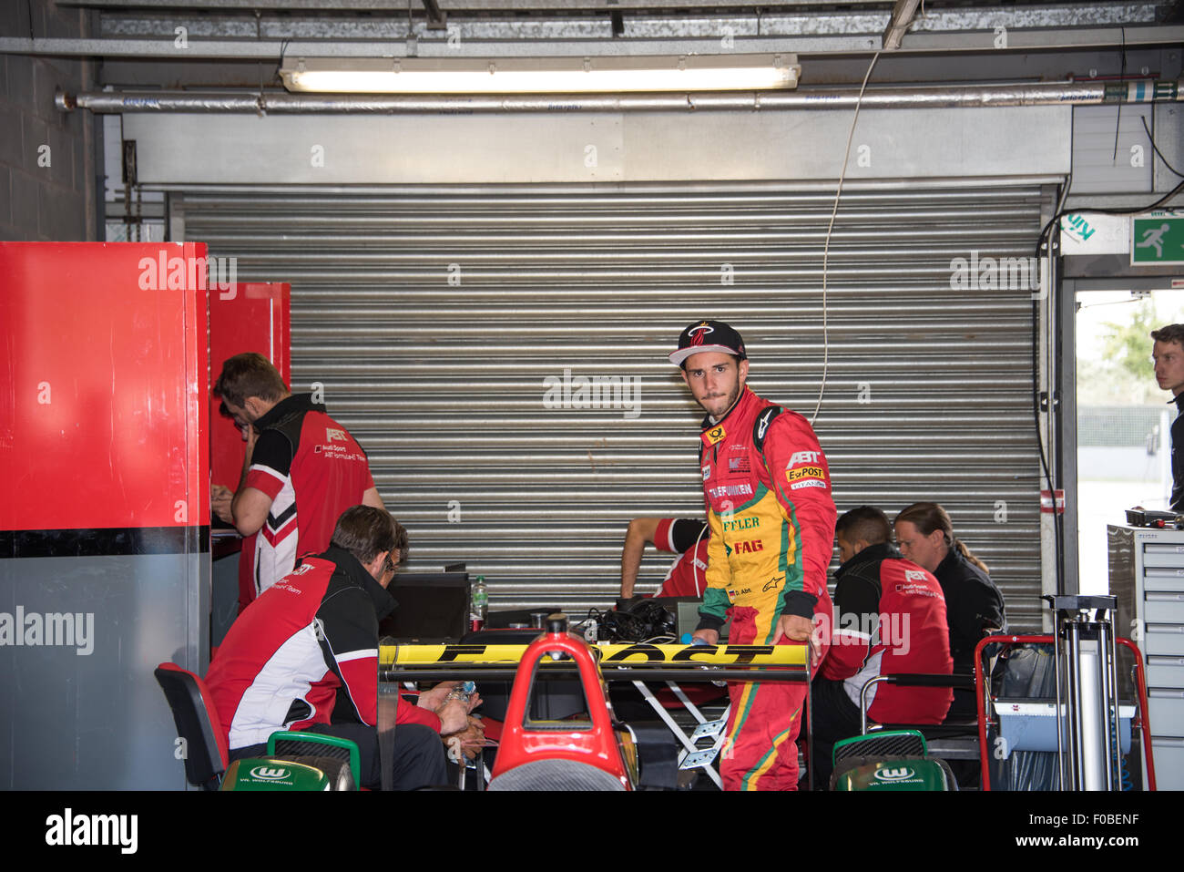 Racing Driver Daniel Abt relaxing in the pits during a break in Formula ...