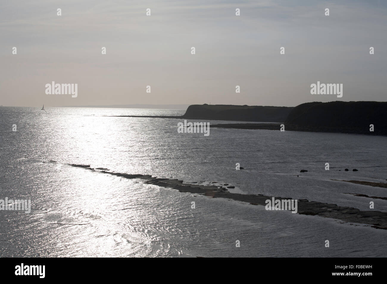 Kimmeridge Bay with it's oil shale cliffs part of The Jurassic Coast of ...