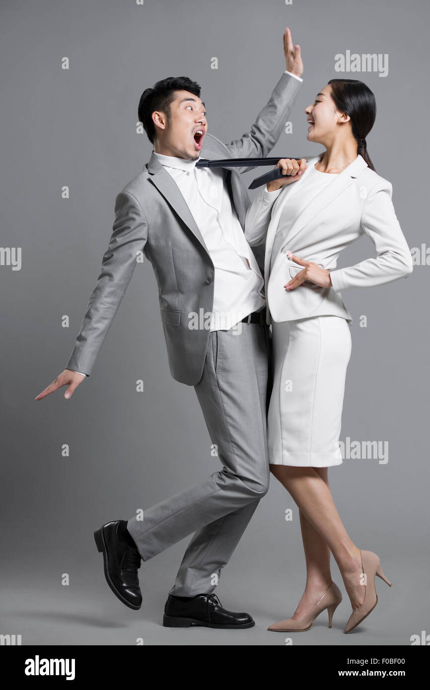 Humorous young business person Stock Photo - Alamy