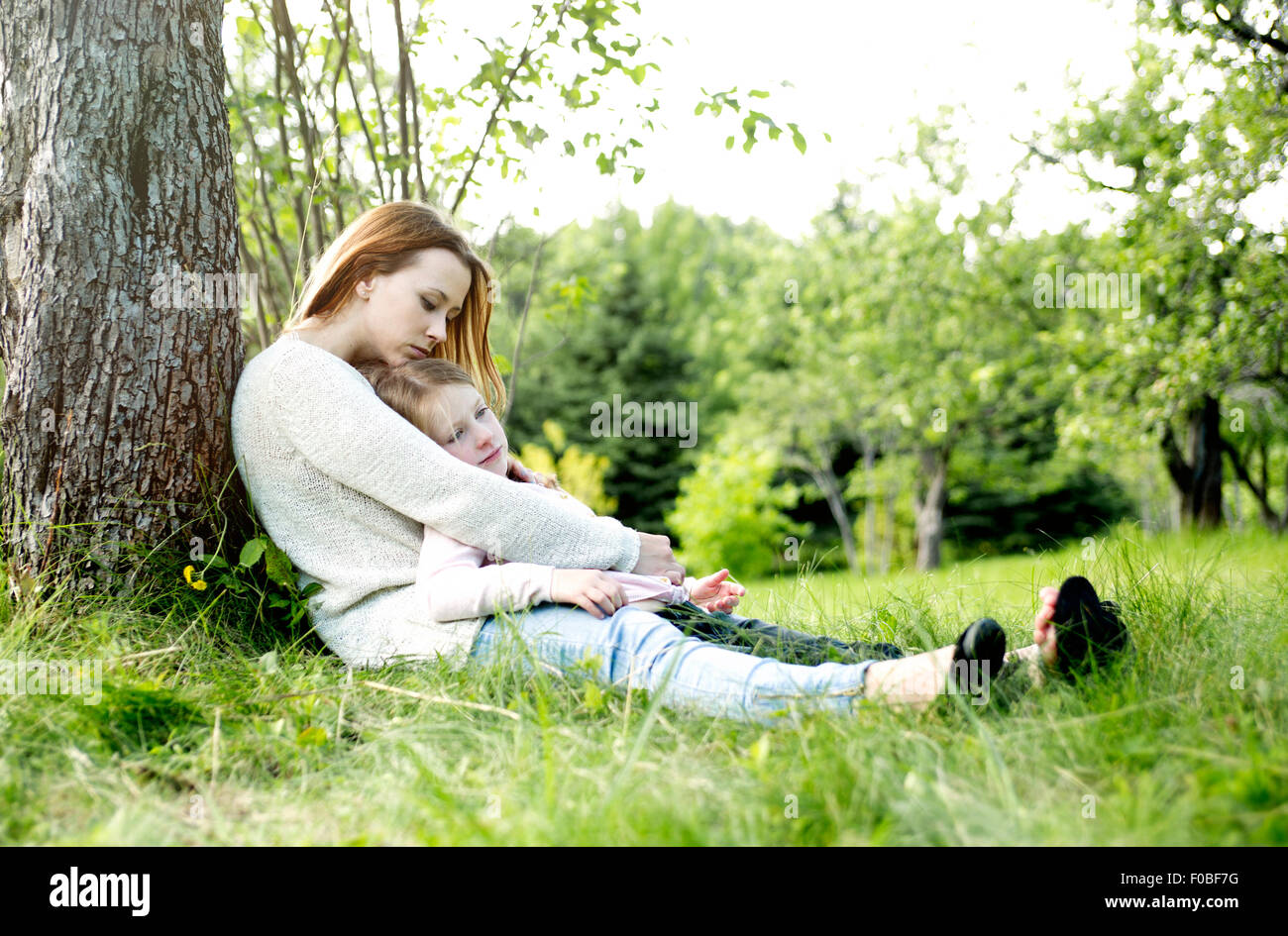 Mother and daughter in forest together Stock Photo - Alamy