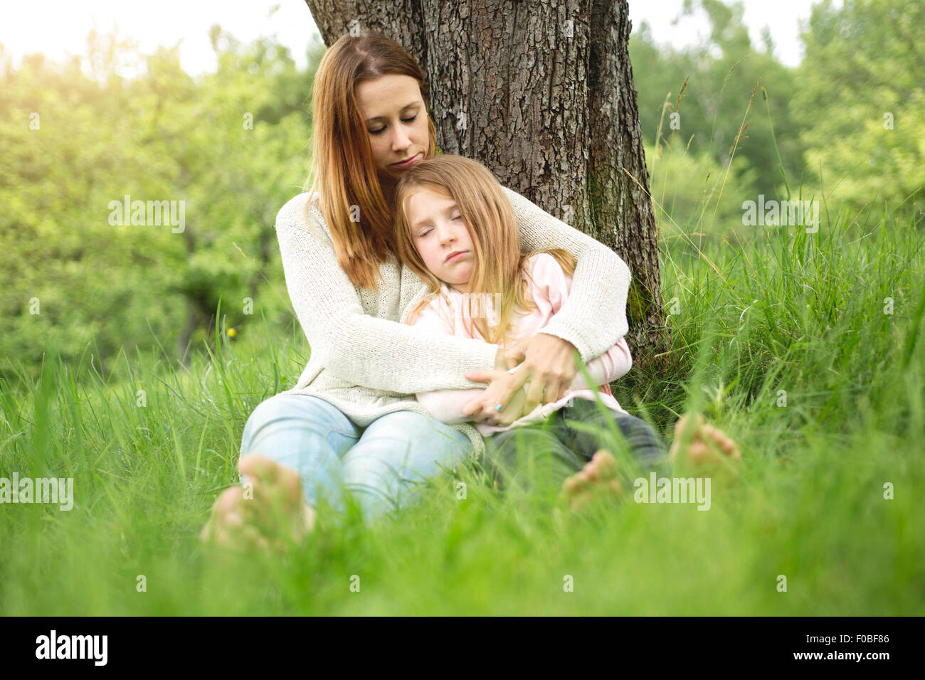 Mother and daughter in forest together Stock Photo - Alamy