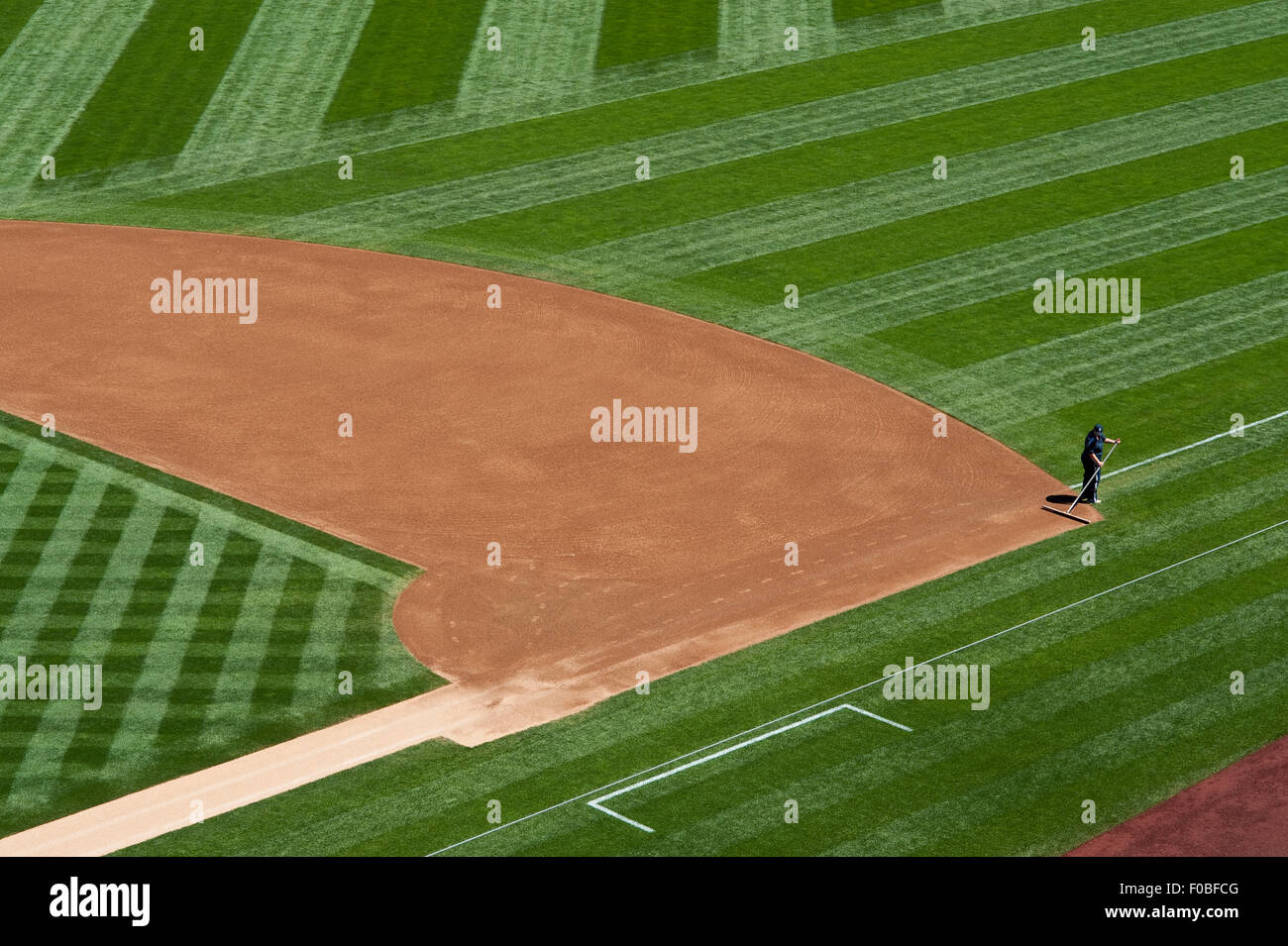 Baseball field abstract patterns with ground crew preparing the field ...
