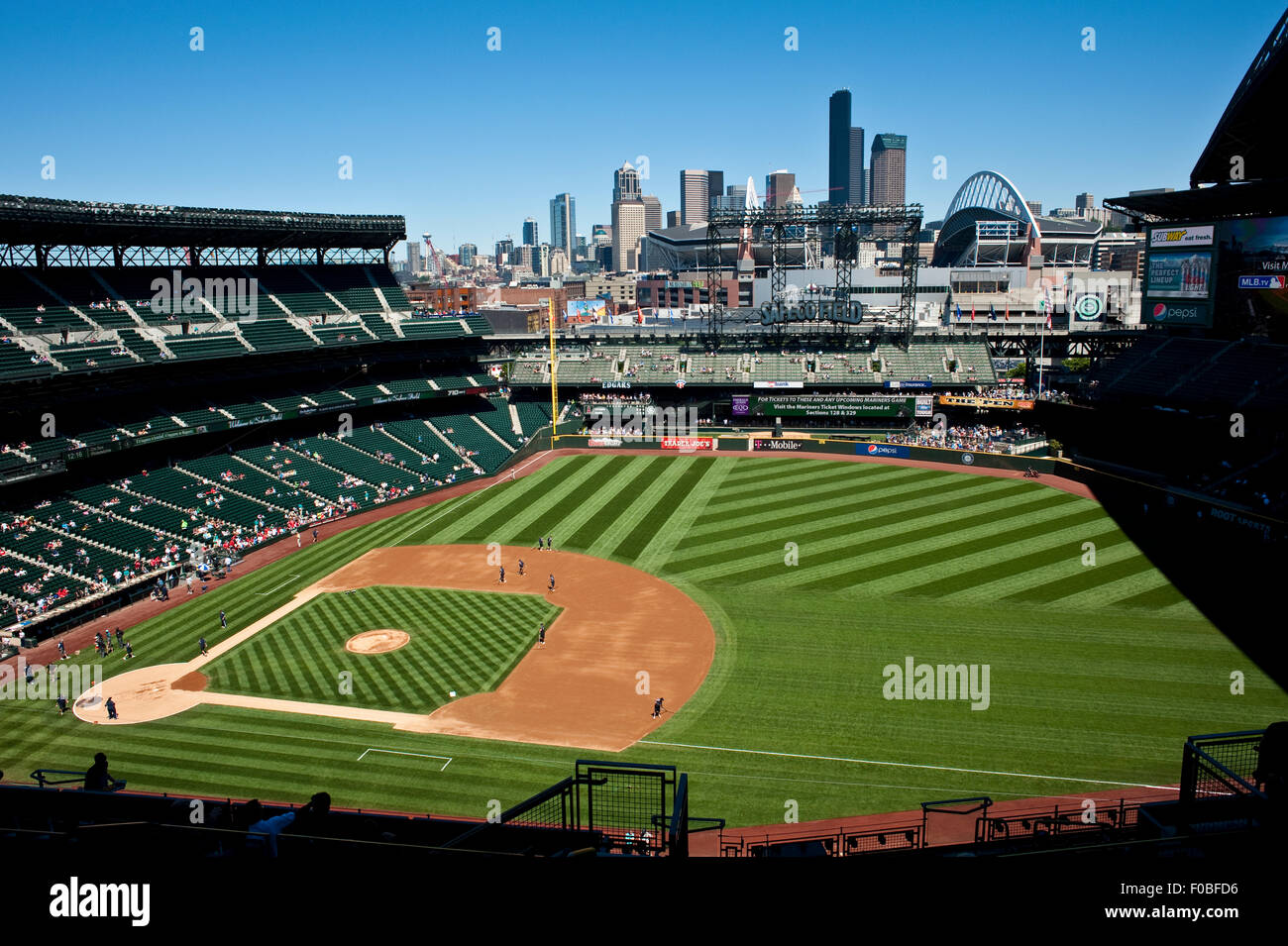 Retro image of Baseball game at Safeco field with Seattle Skyline on a ...