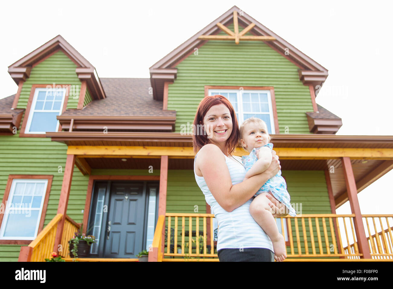 Baby outside of house hi-res stock photography and images - Alamy