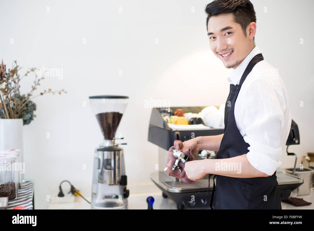 Portrait of barista Stock Photo - Alamy