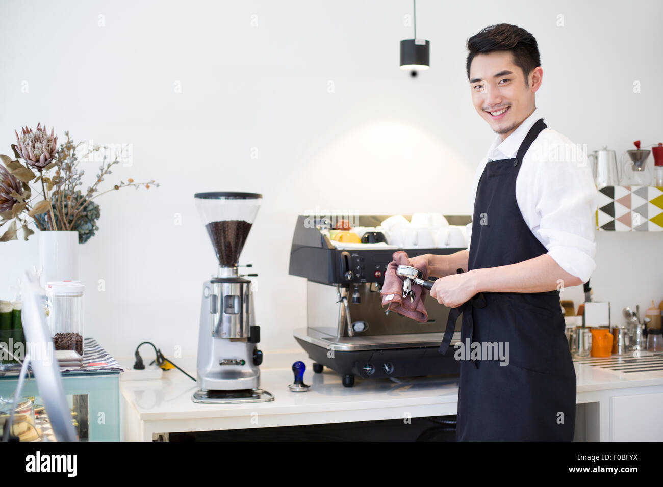 Portrait of barista Stock Photo - Alamy