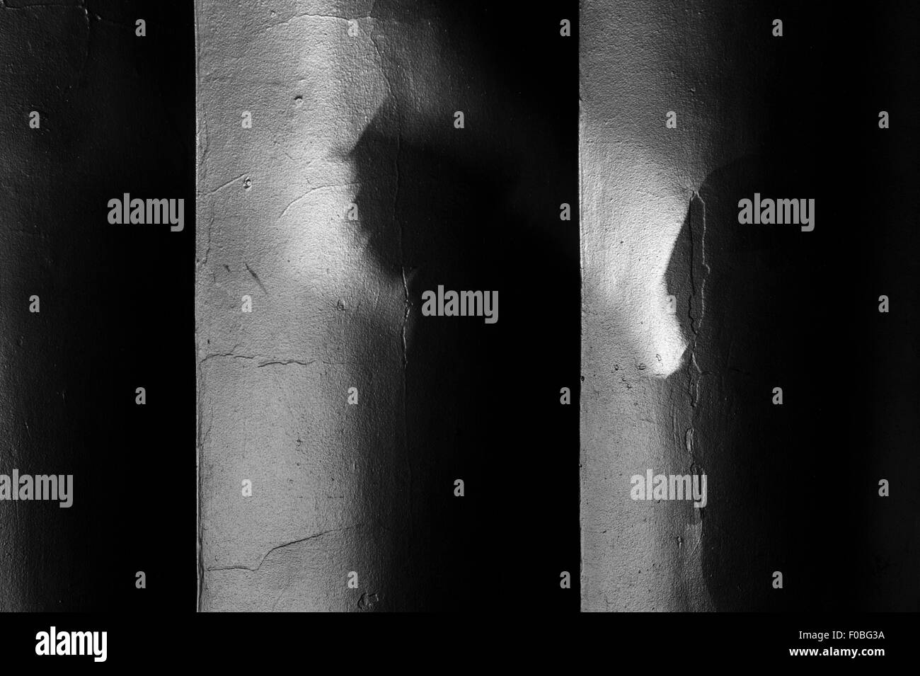 Seattle street scene people's shadows on columns in front of theater ...