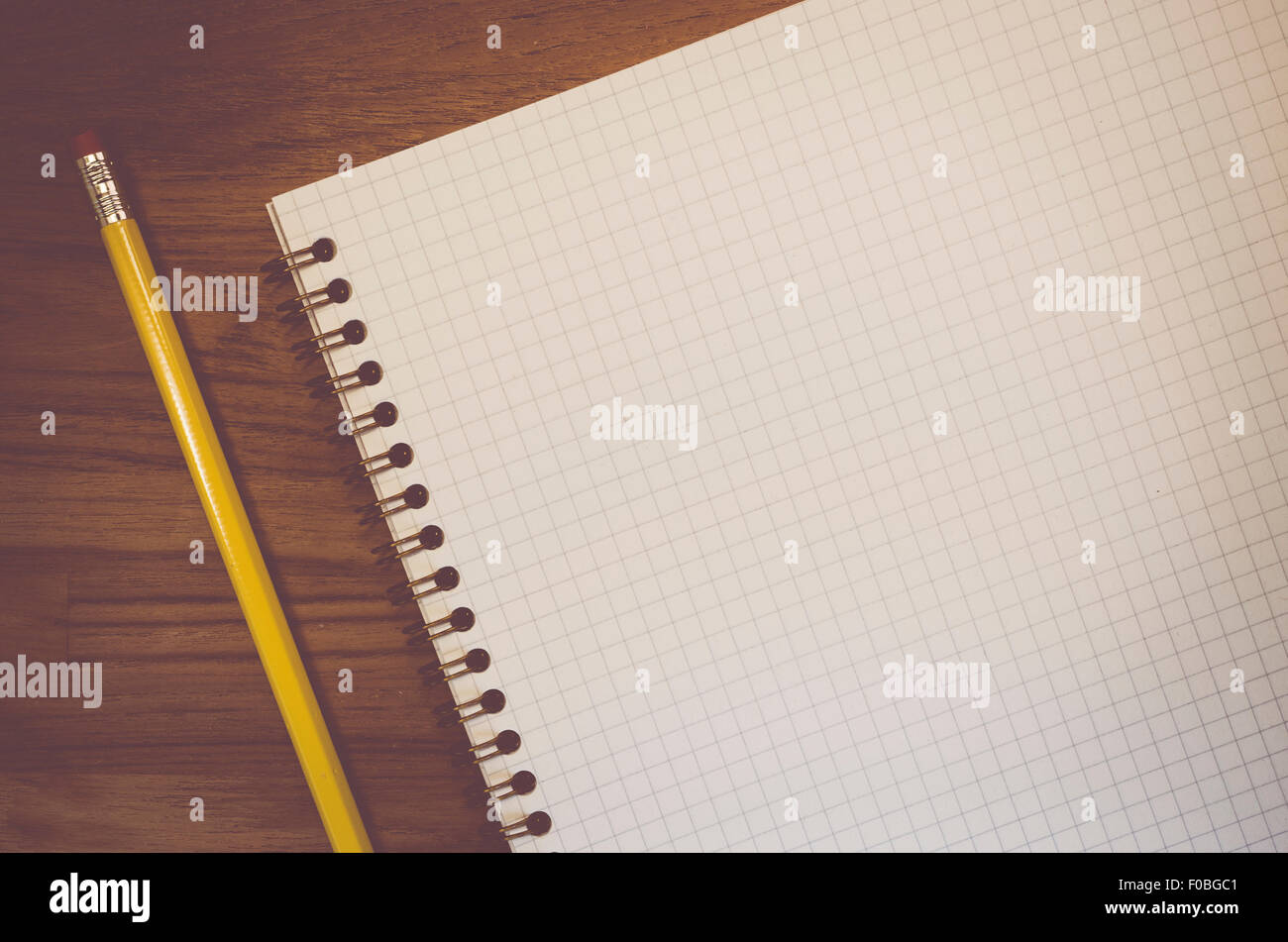 blank squared spiral binding notebook and pencil - stationery ...