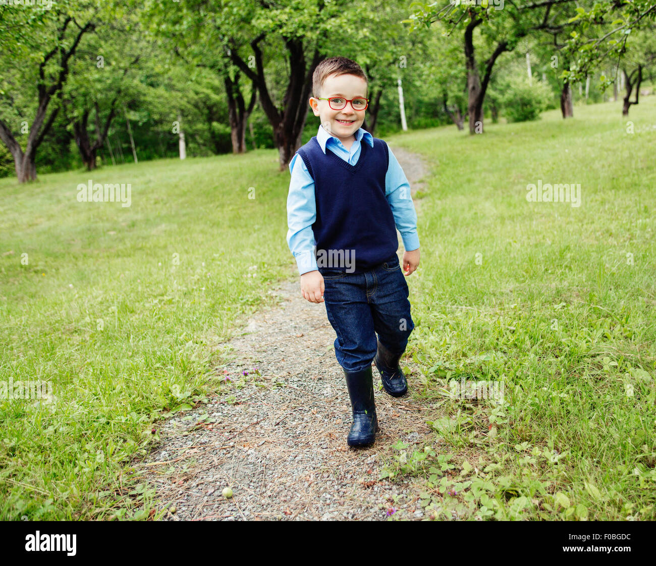 Portrait of cute little boy child outdoors on the nature Stock Photo ...